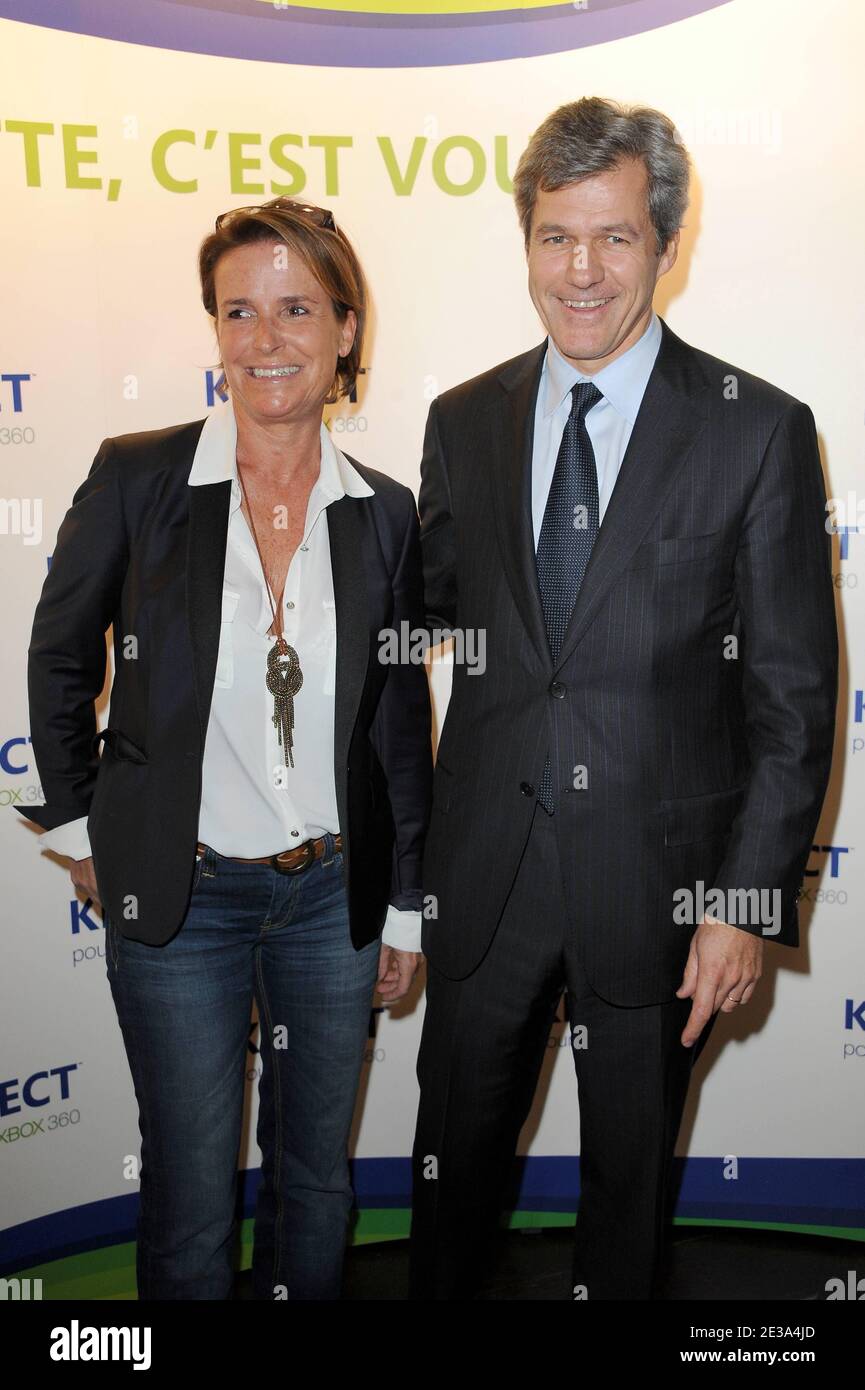 Eric Boustouller and wife attending the Kinect for XBox 360 Party at ...