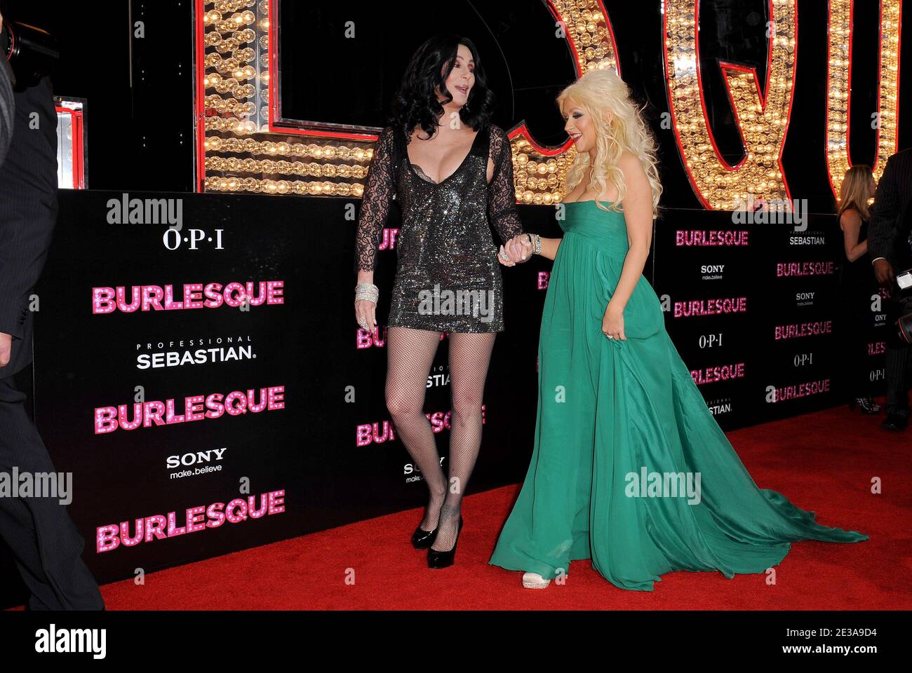 Cast members Christina Aguilera and Cher arriving for the premiere of ...