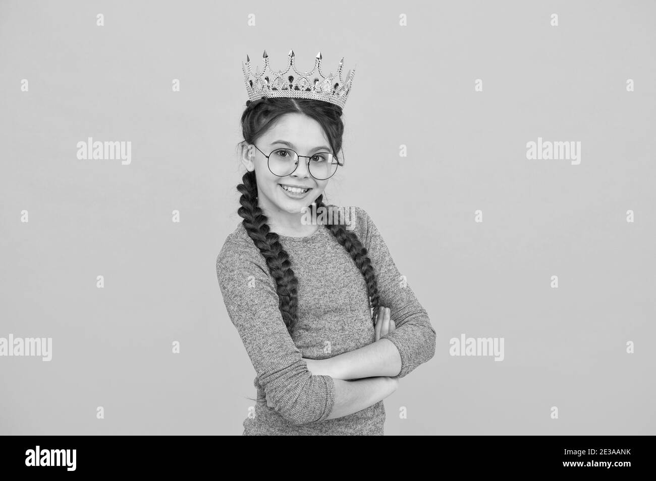 Being her own boss. Little boss yellow background. Happy child wear ...