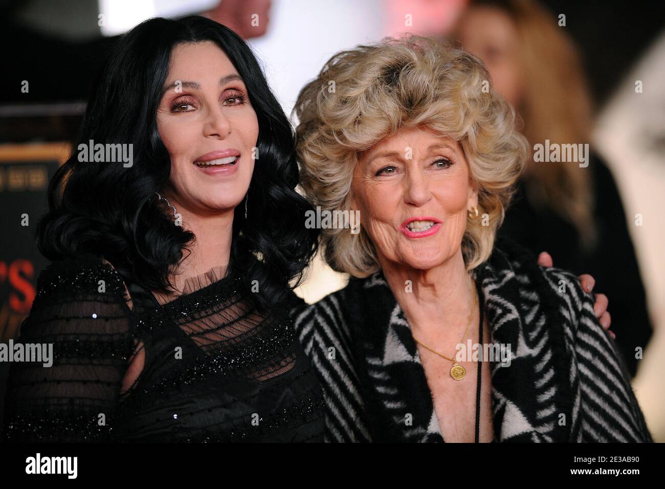 Cher, here with her mother Georgia Holt, is honored with a hand and ...