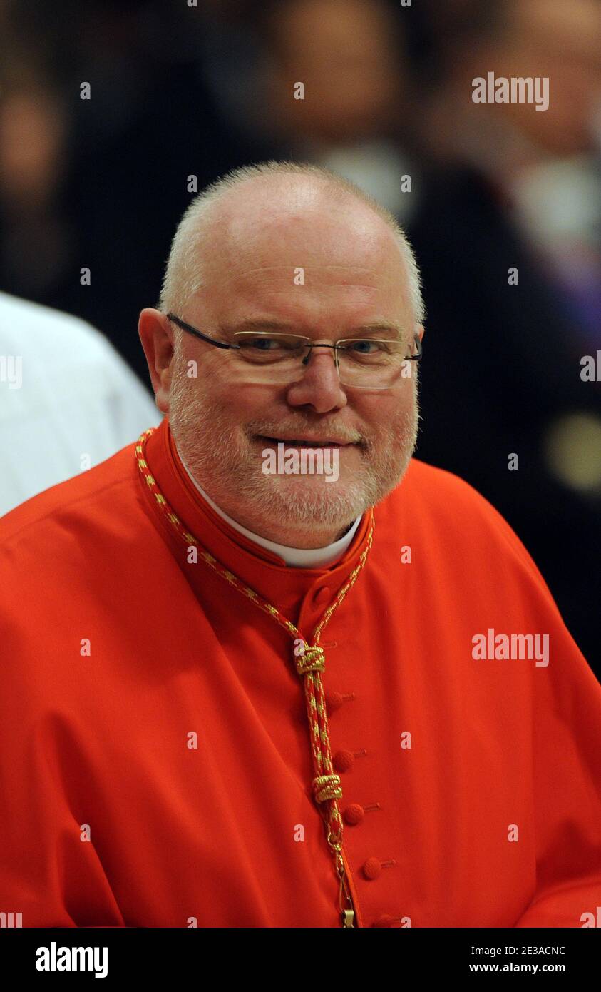 German Cardinal Reinhard Marx receives the biretta cap from Pope ...
