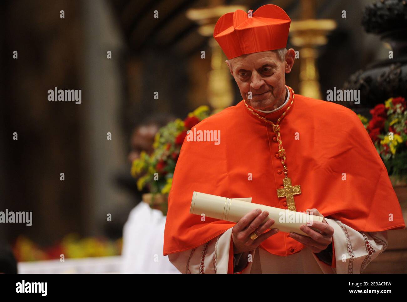 New cardinal Donald William Wuerl (USA) receives the biretta cap from ...
