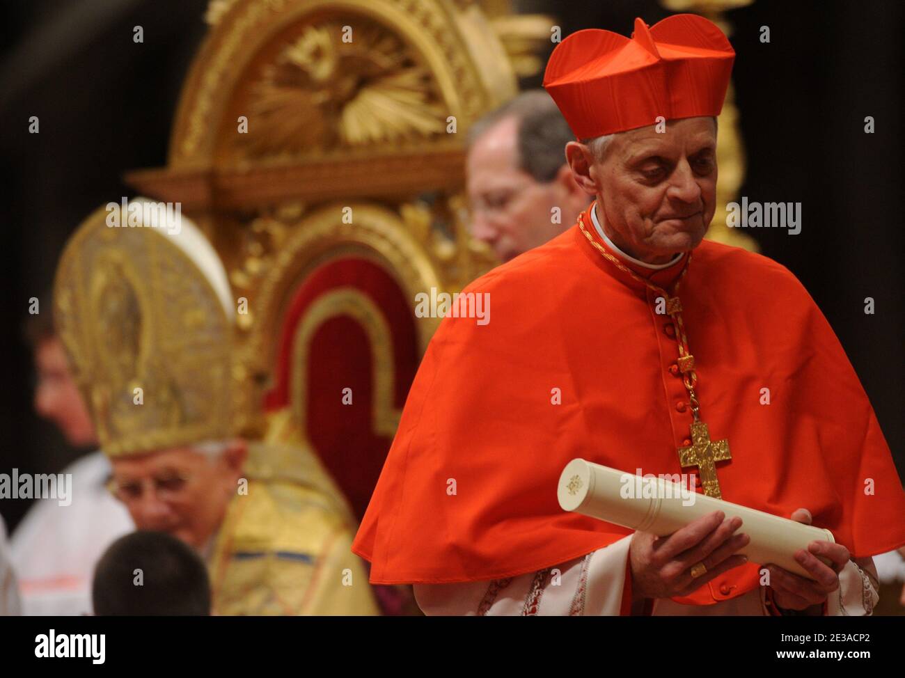 New cardinal Donald William Wuerl (USA) receives the biretta cap from ...