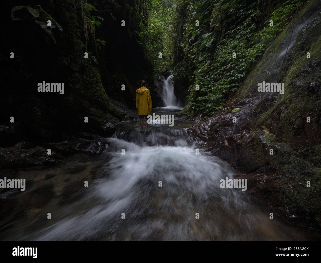 Panorama view of Cascada Colibries waterfall in tropical rain cloud ...