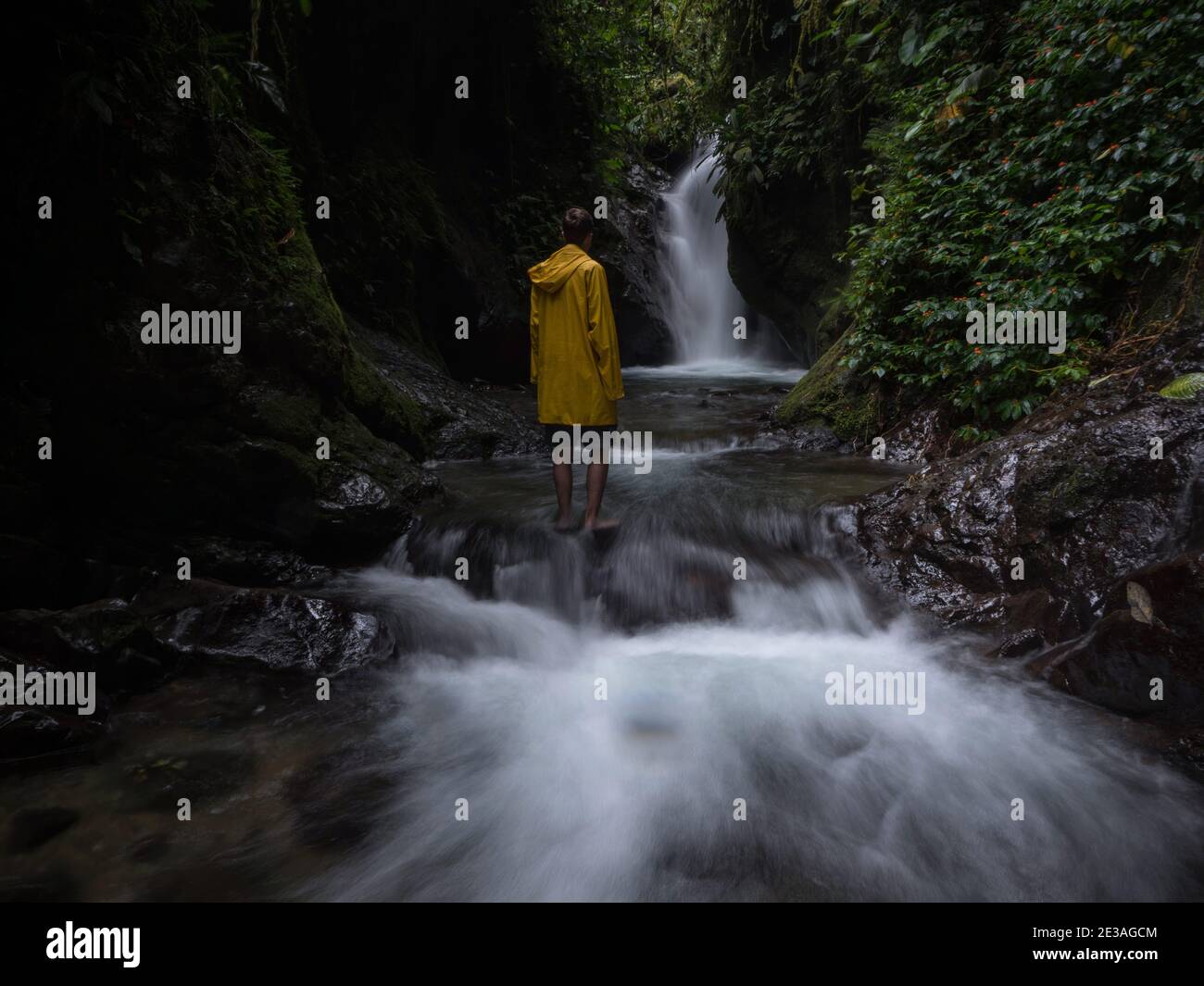 Panorama view of Cascada Colibries waterfall in tropical rain cloud ...