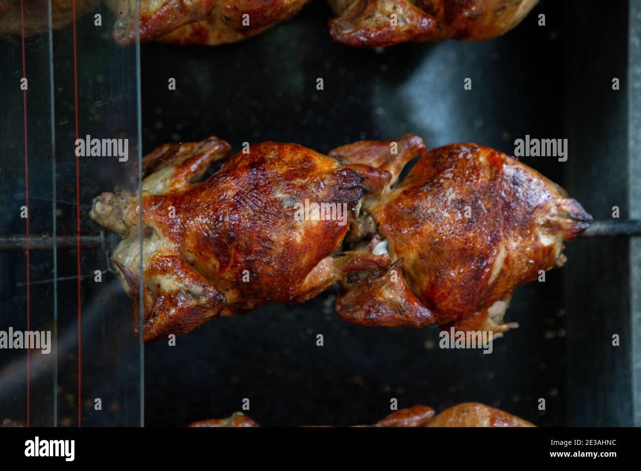 Chickens on the spit hi-res stock photography and images - Alamy