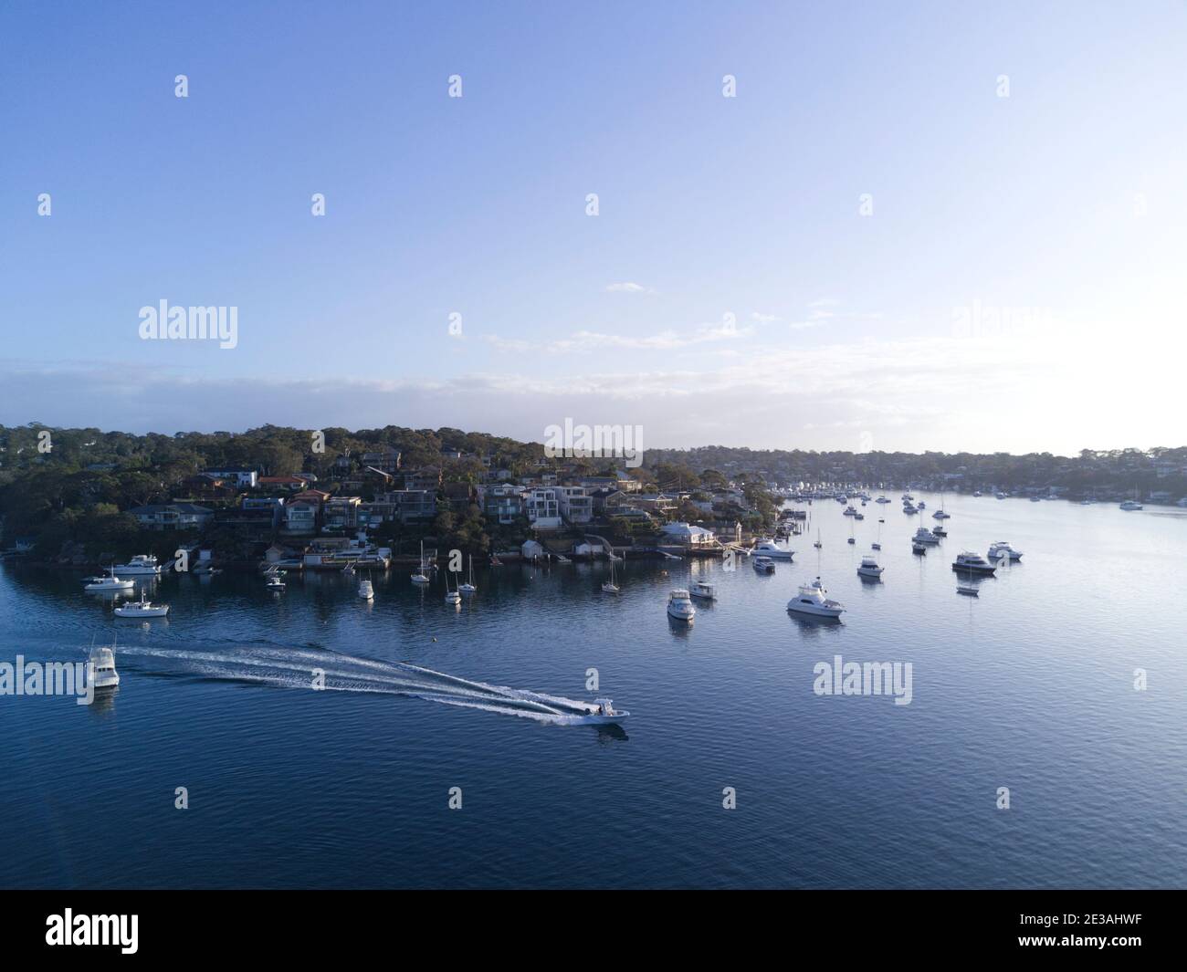 Aerial of the waterfront houses lining the shores of Burraneer Bay at ...