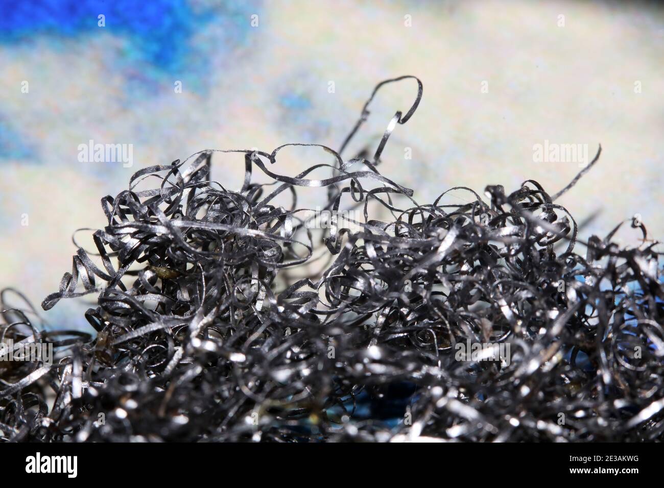 Steel curly dish washing metal wire close up macro modern background ...