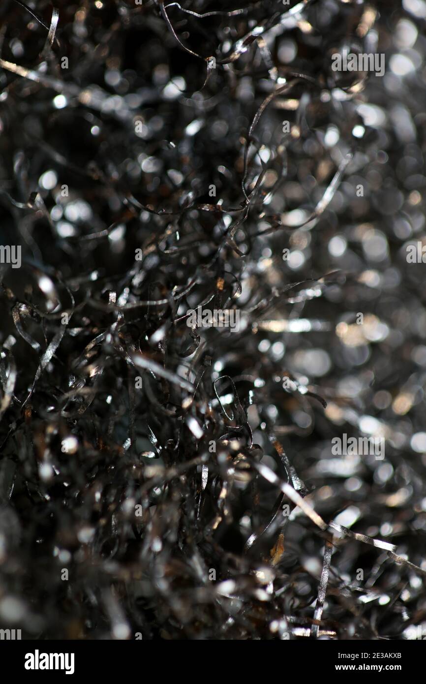 Steel curly dish washing metal wire close up macro modern background ...
