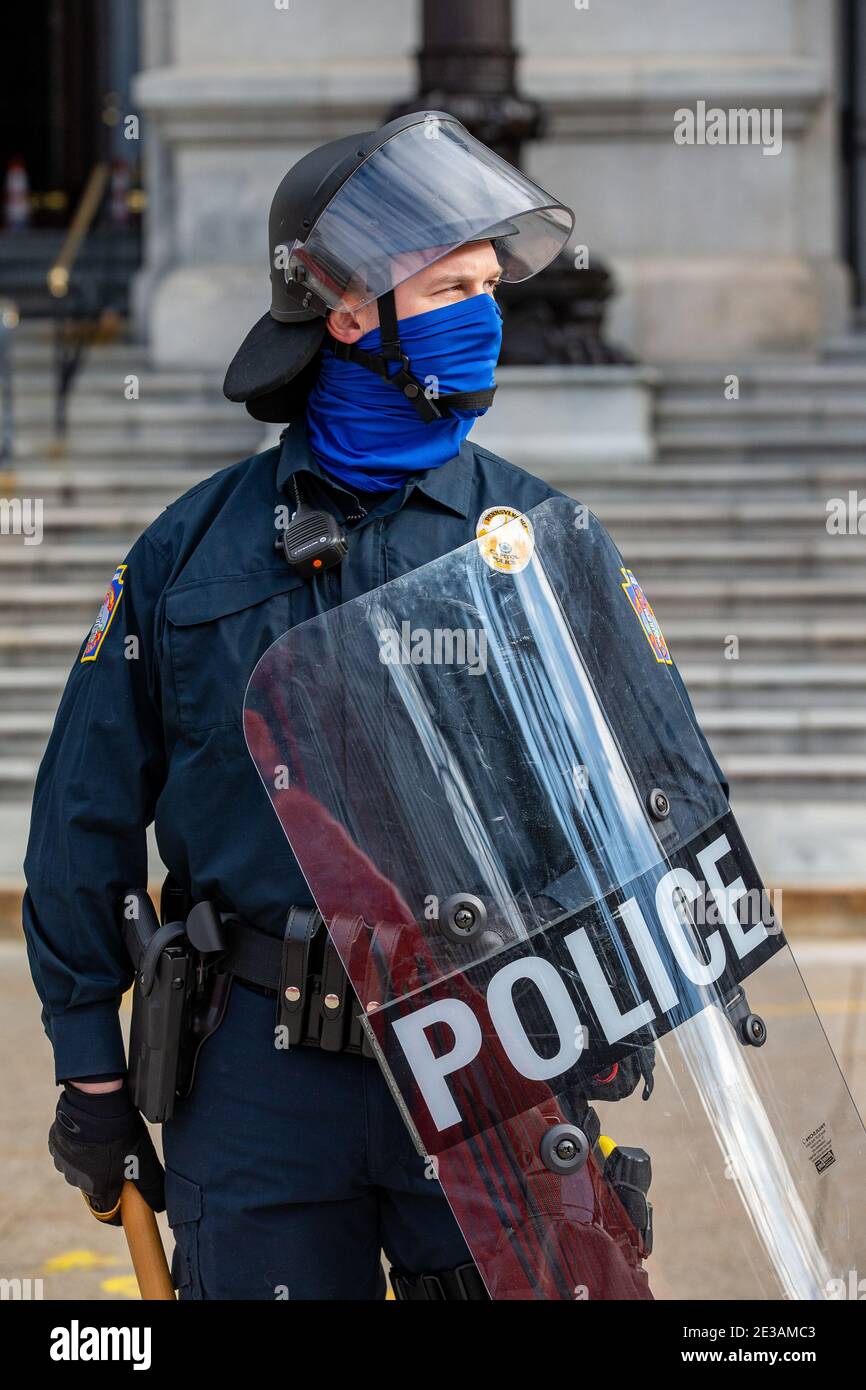 A Pennsylvania Capitol Police officer guards the entrance to the ...
