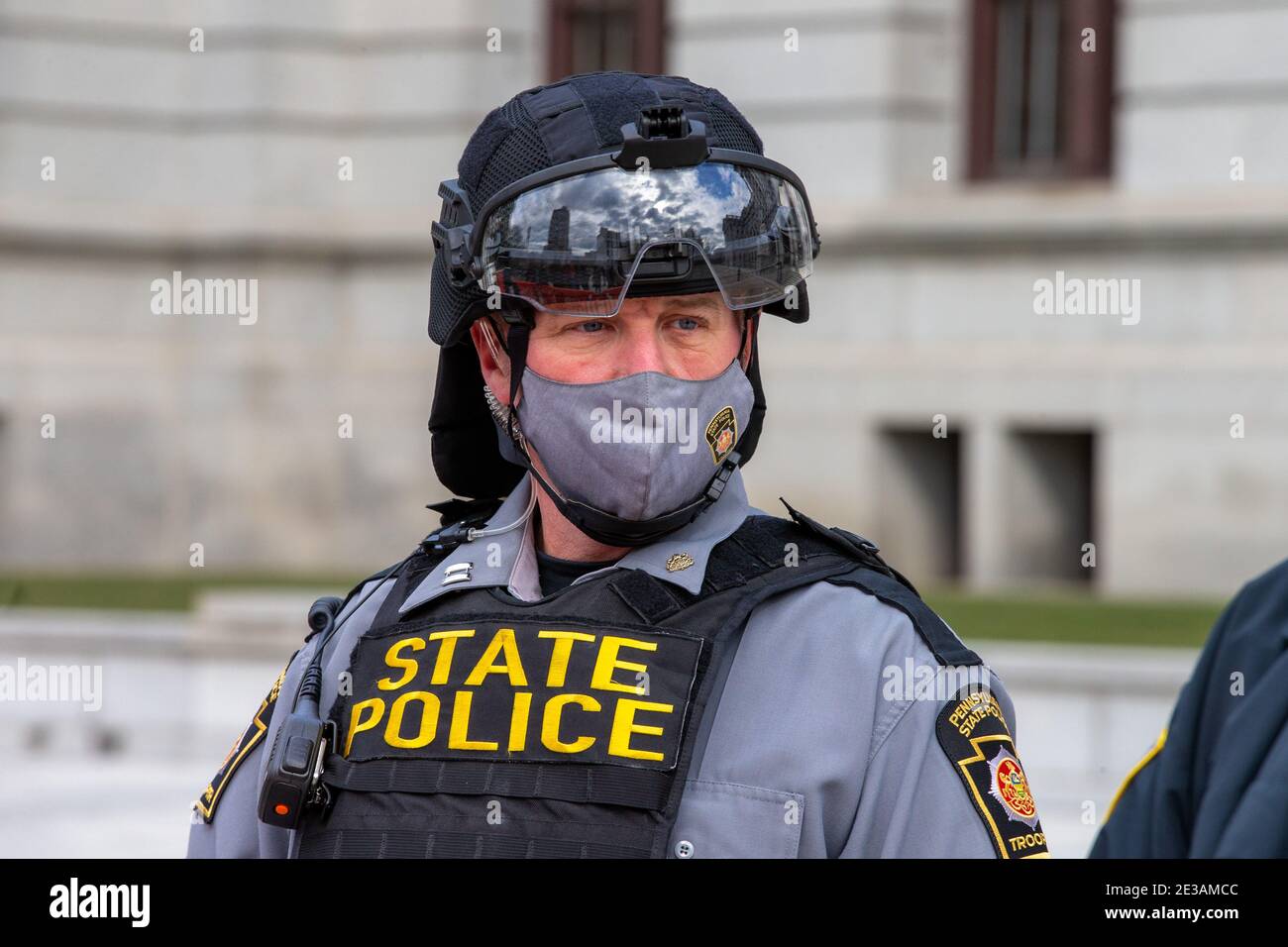 A Pennsylvania State Police trooper guarda the Pennsylvania State ...