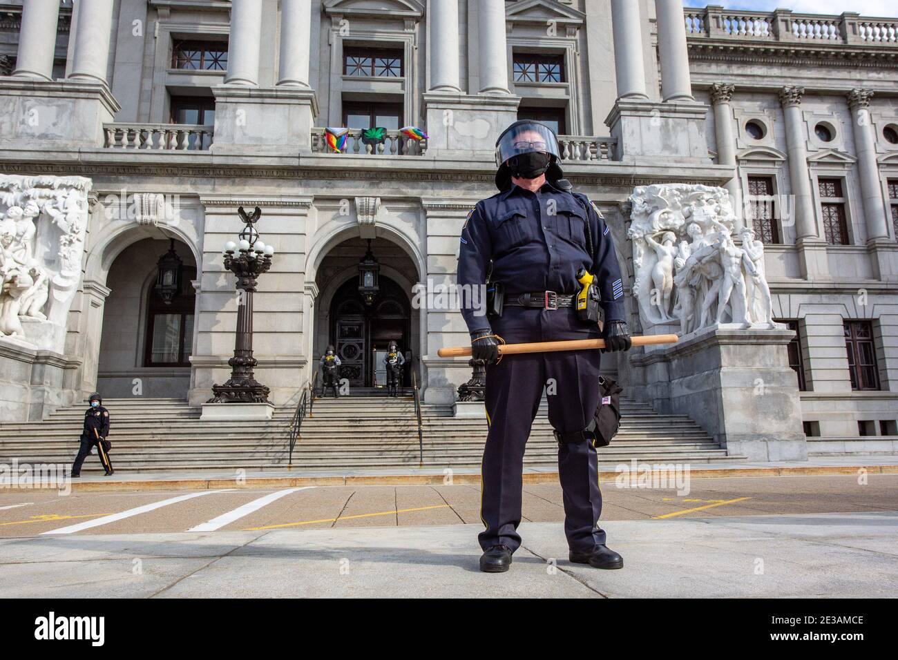 A Pennsylvania Capitol Police officer guards the entrance of the ...