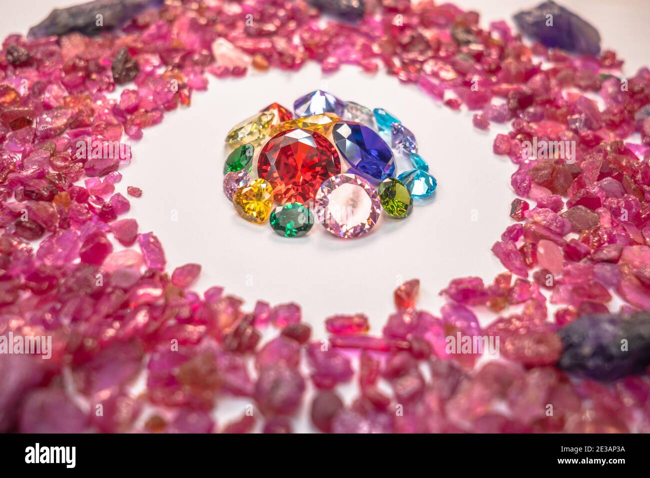 colorful diamonds in different size and many shape are place in the ...