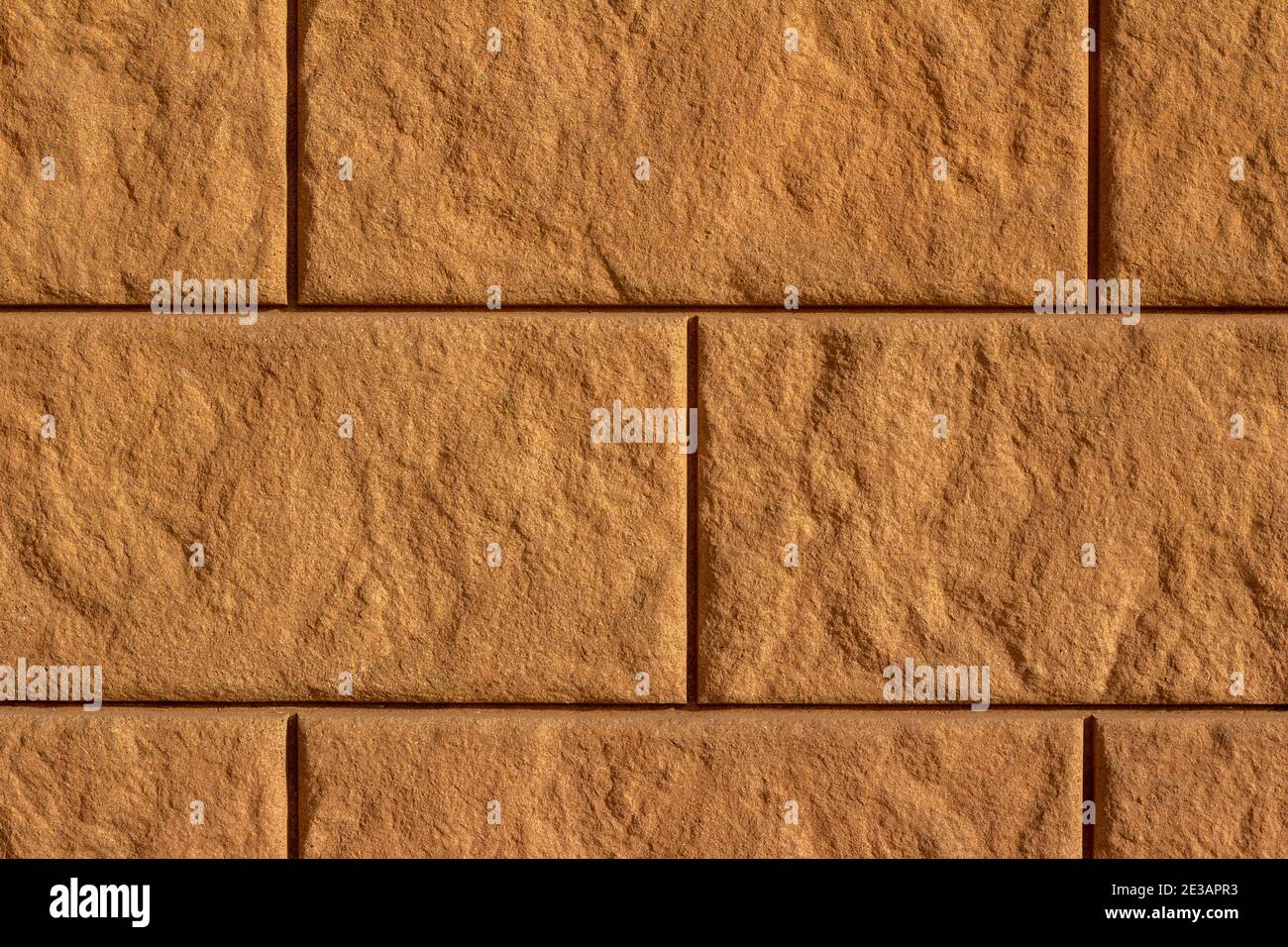 Full frame abstract background of an attractive modern tan brown stone ...