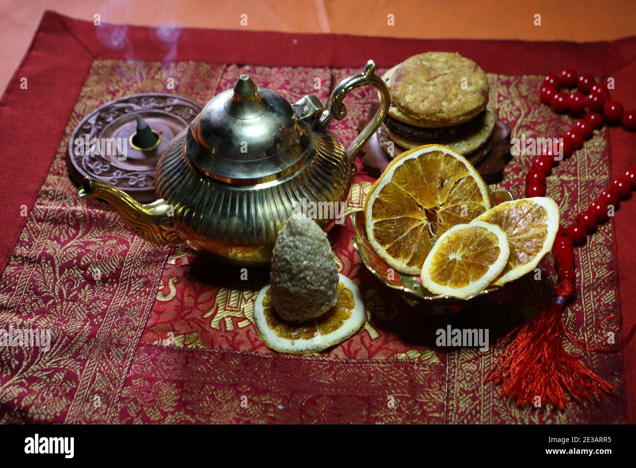 Indian tea with sweets Stock Photo - Alamy