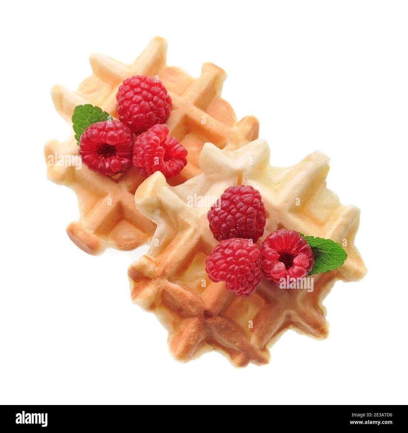 Homemade waffles with raspberries with mint isolated on white ...