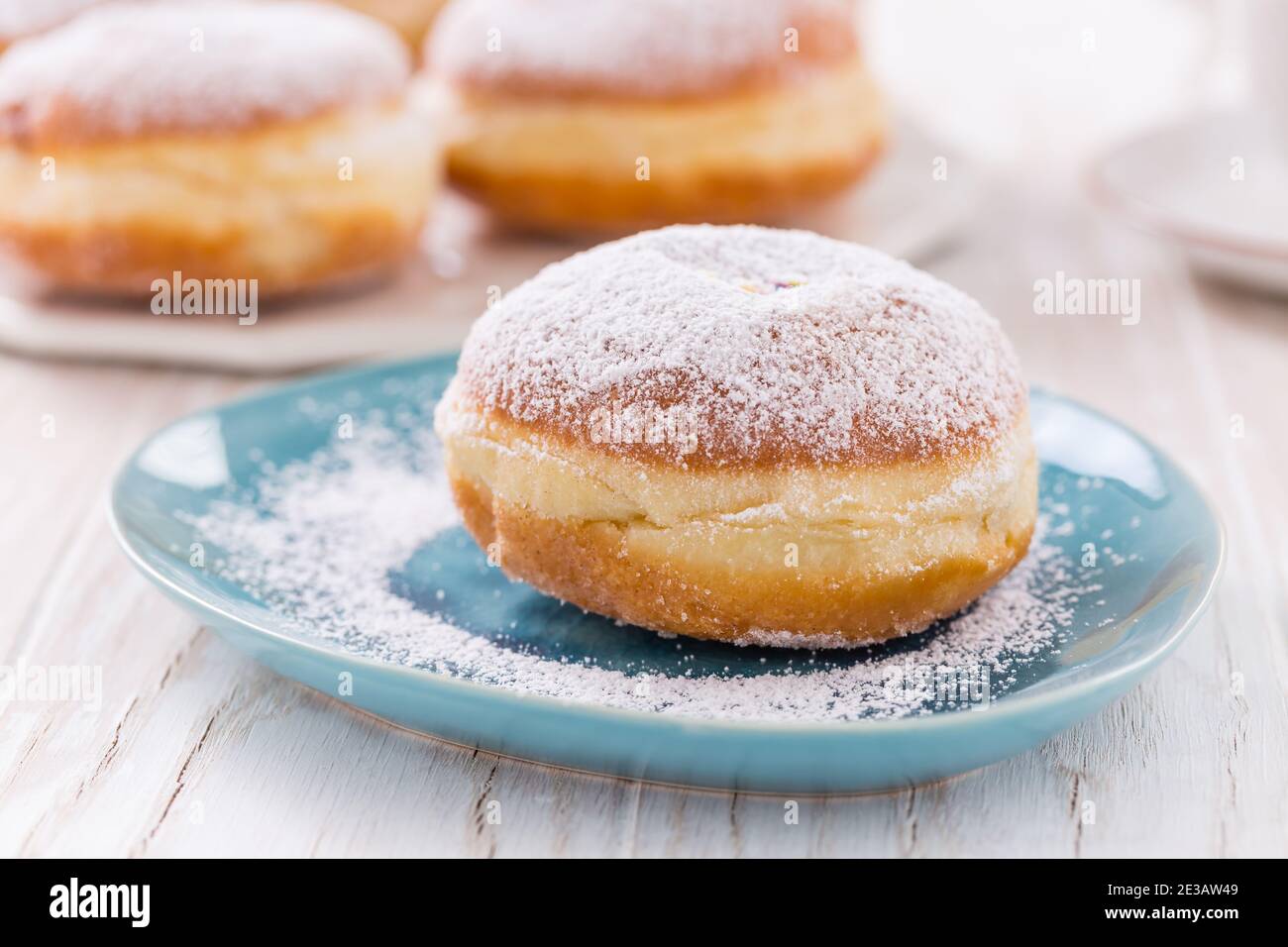 Traditional German Krapfen, Berliner or donuts with icing sugar Stock ...