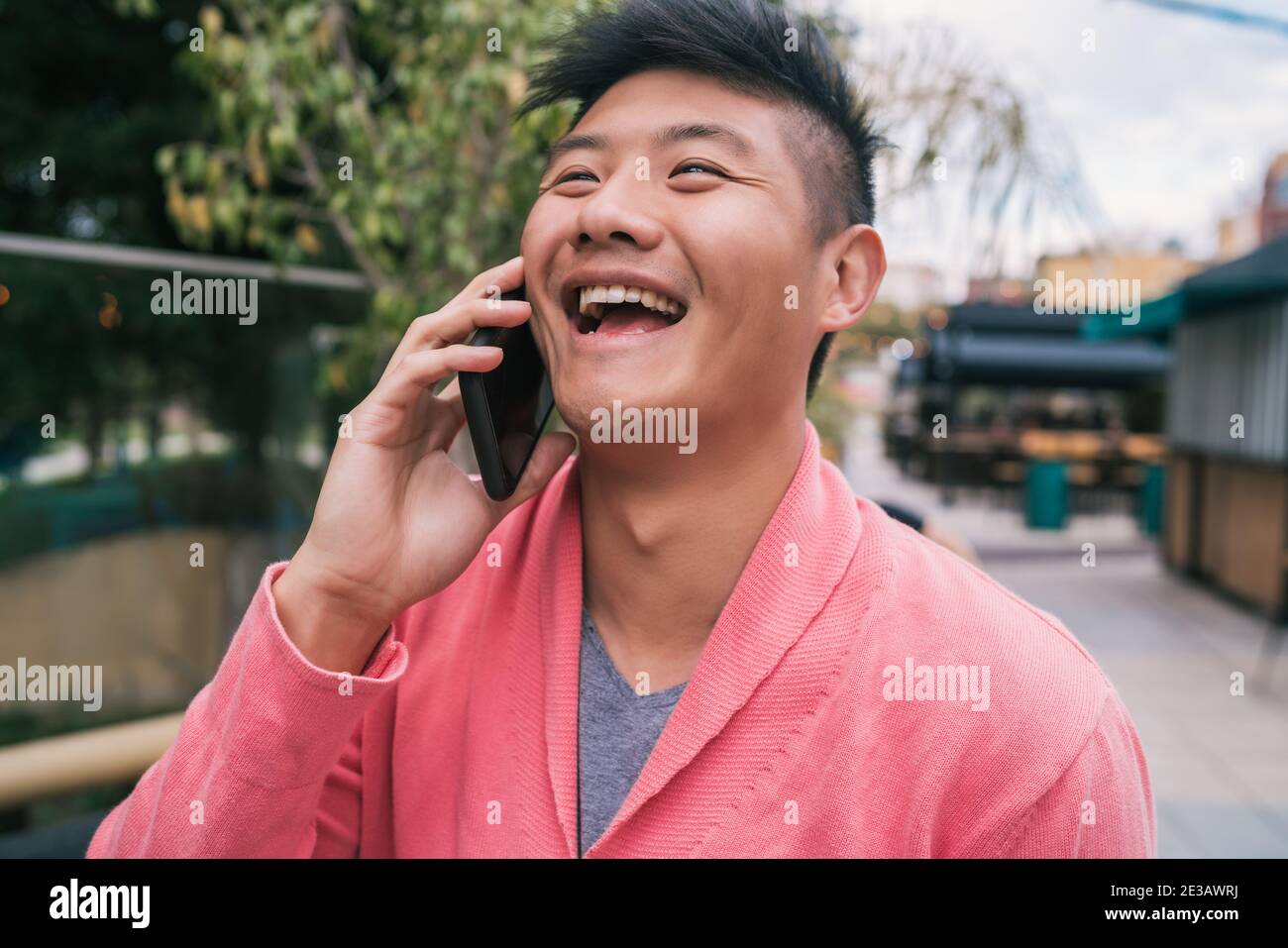 Asian man talking hi-res stock photography and images - Alamy