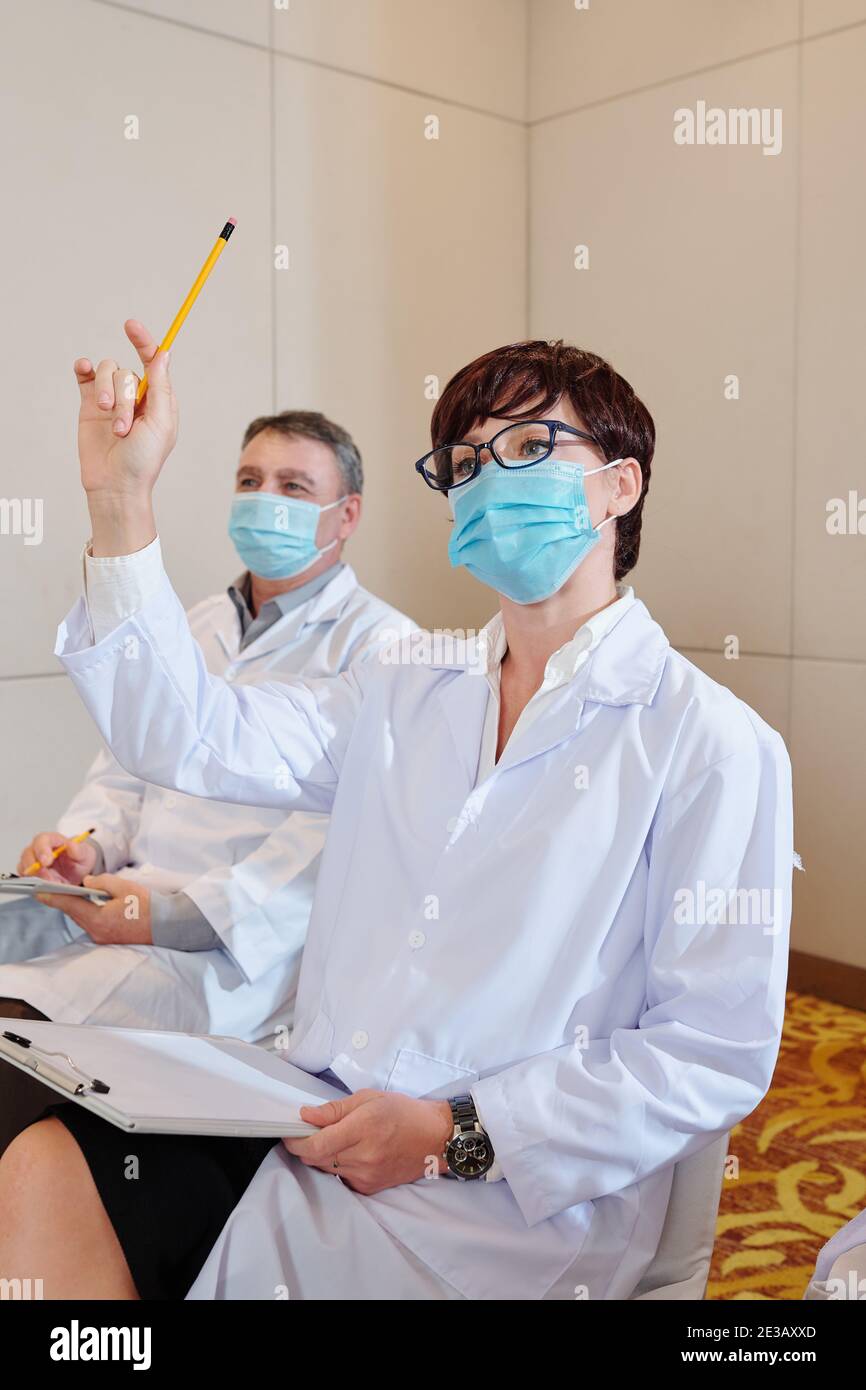 Female speaker medical conference hi-res stock photography and images ...