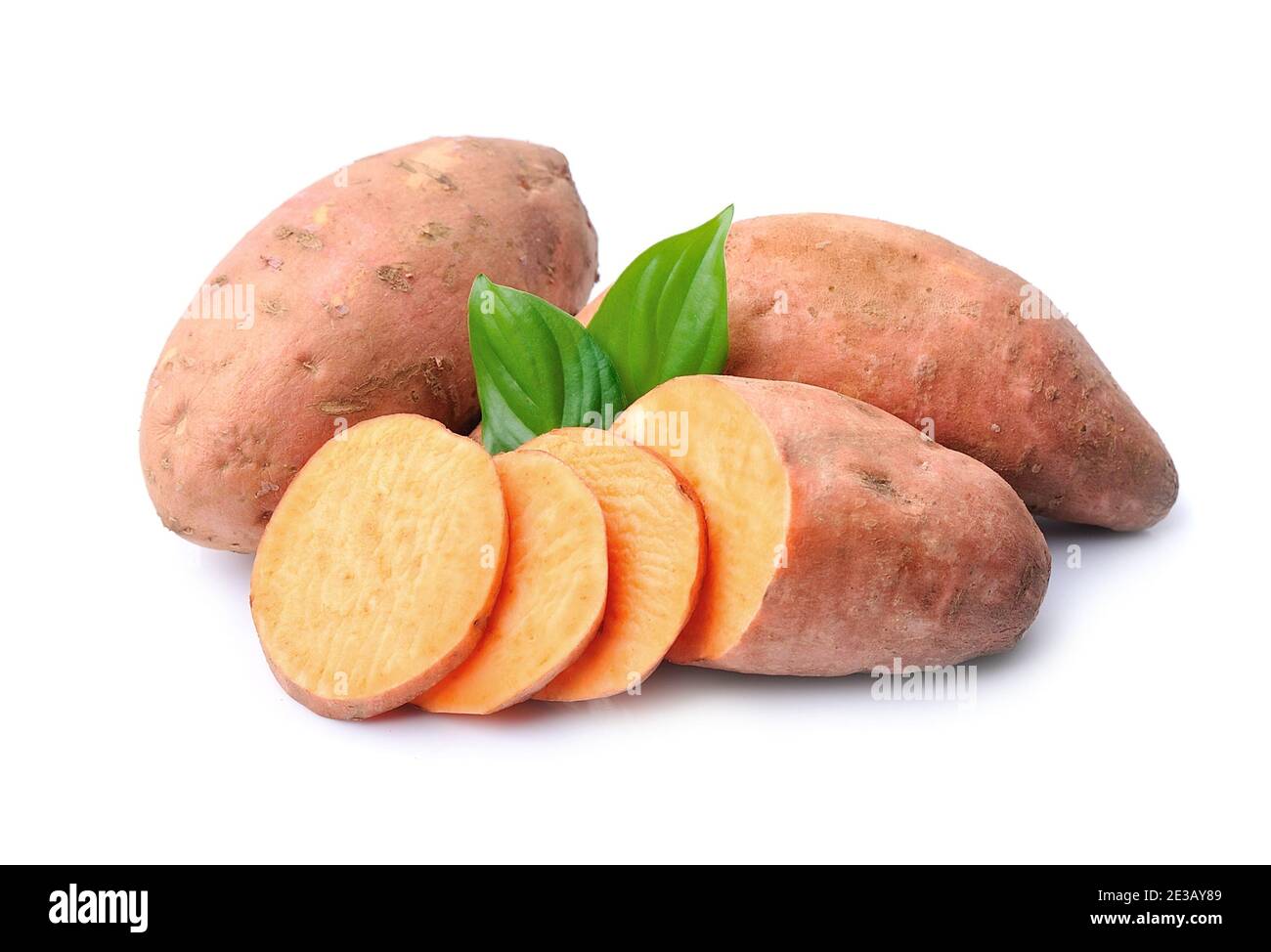 Sweet potato in closeup on a white backgrounds Stock Photo - Alamy