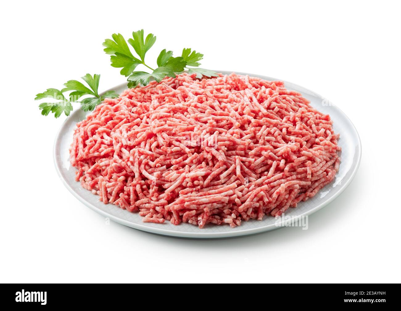 Minced meat served on a round plate on a white background Stock Photo ...