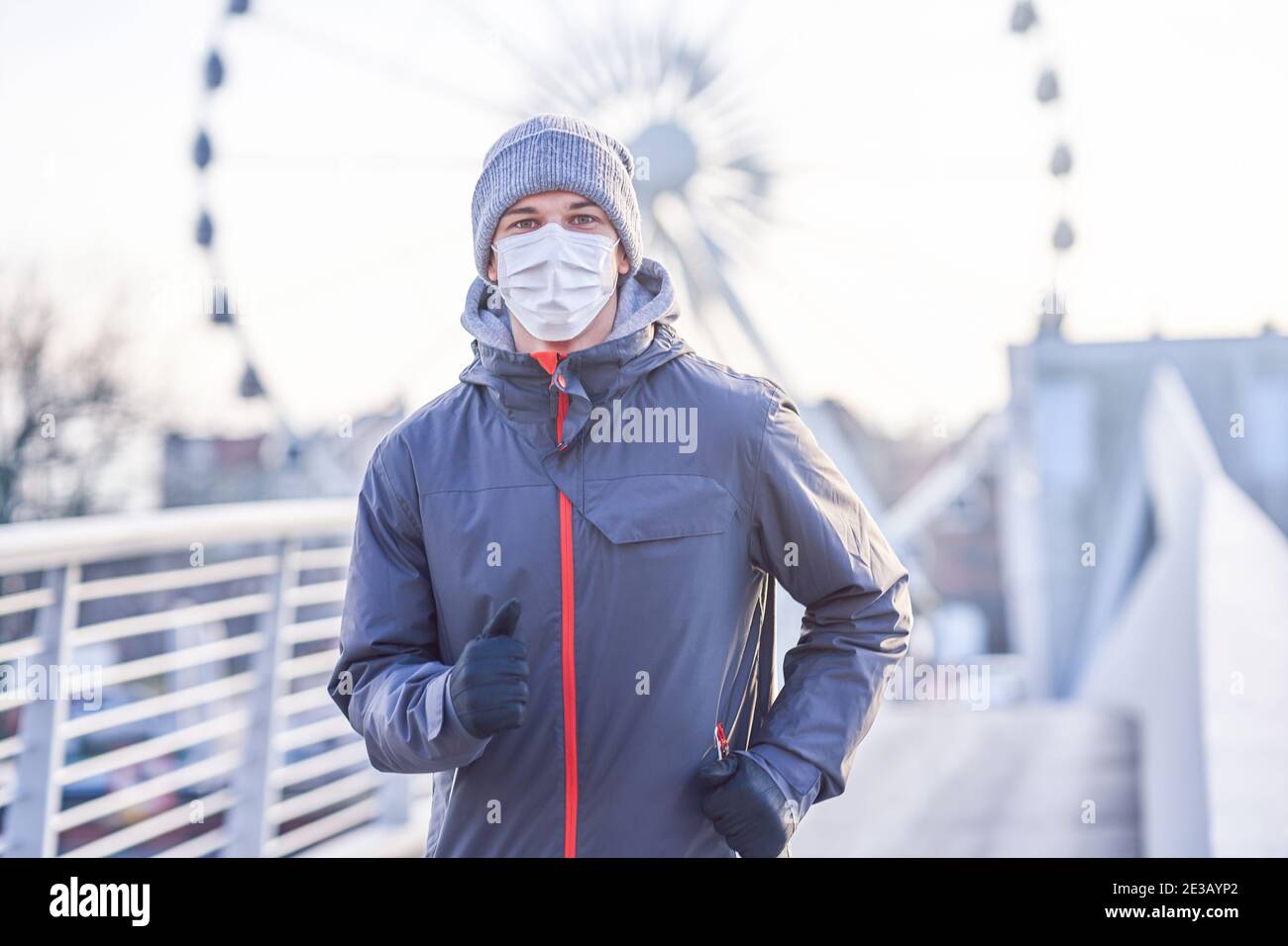 Adult man jogging in the city in masks during lockdown Stock Photo - Alamy