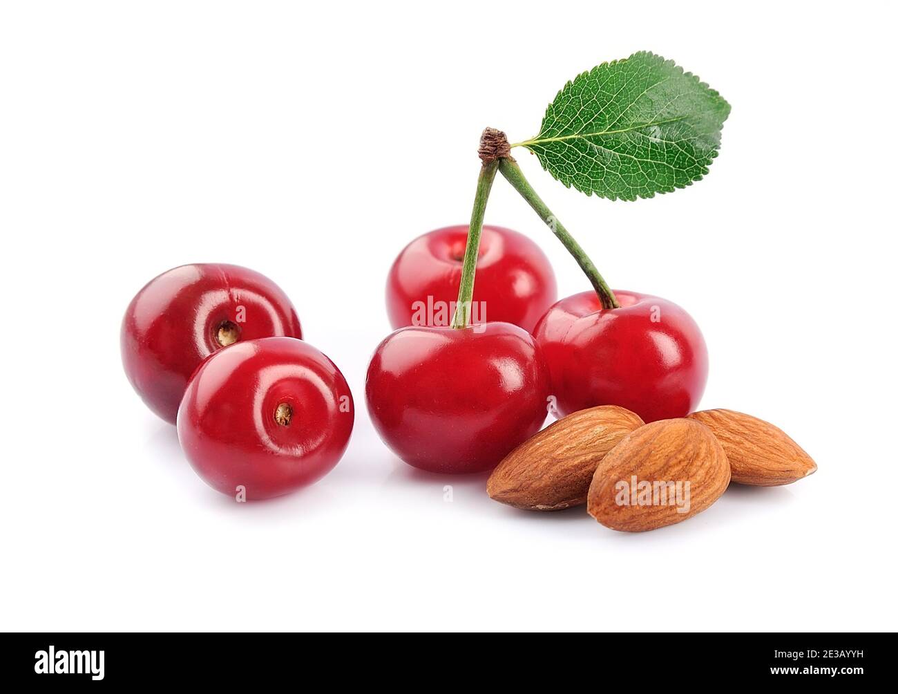 Cherry berry with almonds nuts isolated on white backgrounds Stock ...