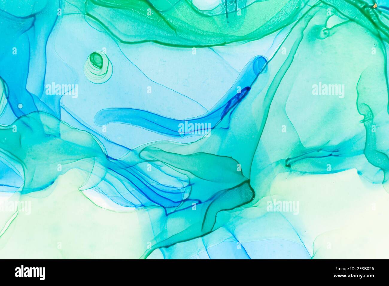 Gradient green and blue ink stains on white background Stock Photo - Alamy