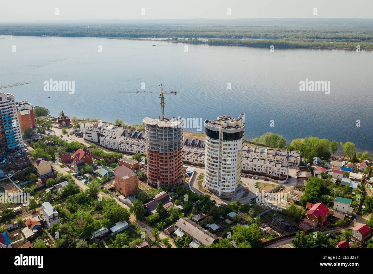 Aerial construction site near river view building in progress Stock ...