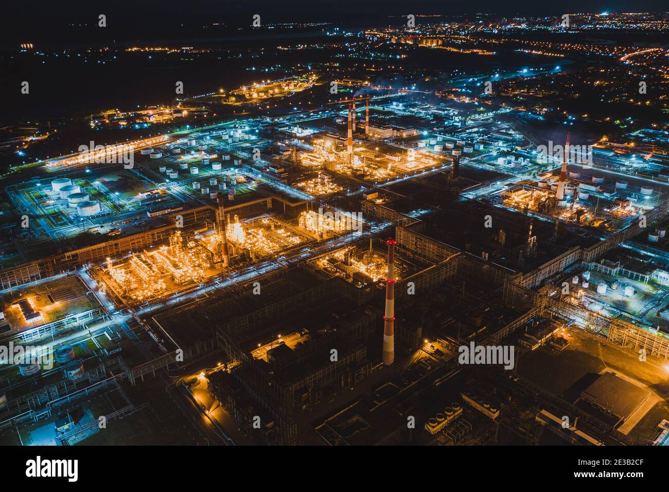 Chemical oil refinery factory night aerial view Stock Photo - Alamy