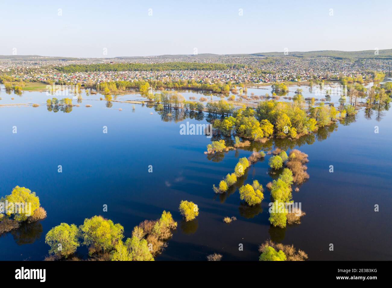 Spring overflow landscape, trees and bush impounded by spring high ...