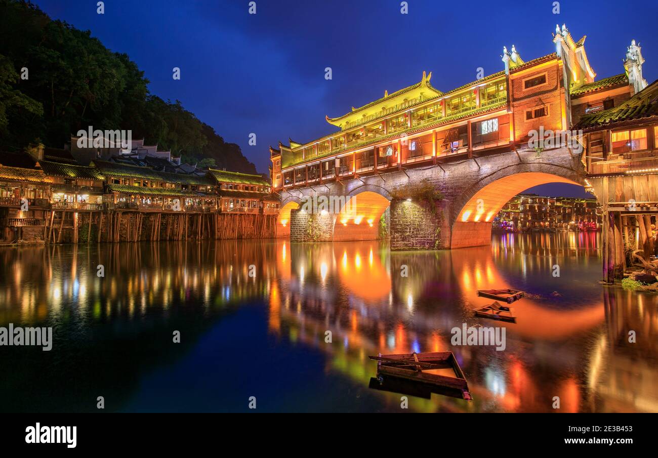 Hong bridge (Rainbow bridge) at night in Fenghuang old city ,Hunan ...