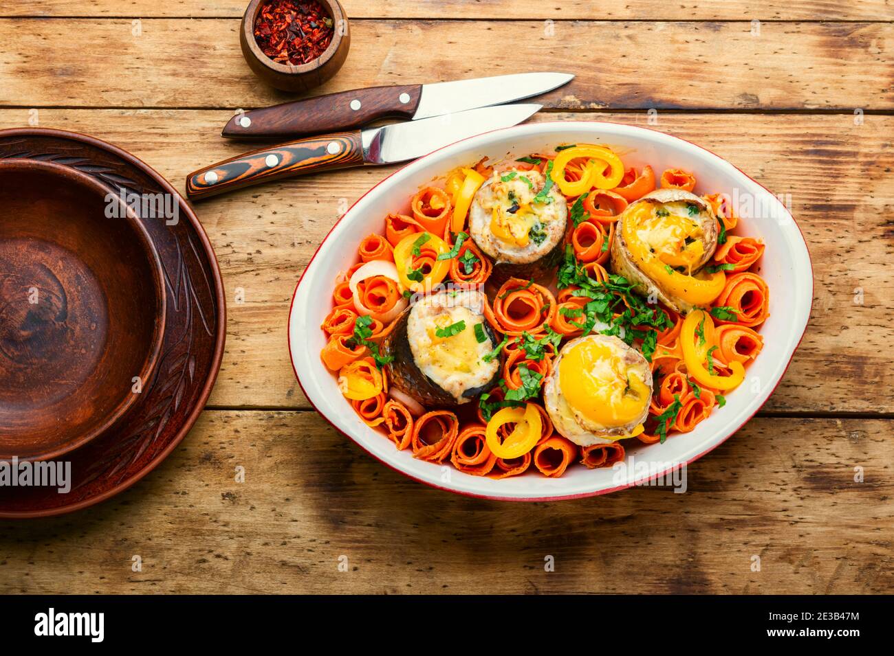 Diet fish fillet rolls baked with cheese and vegetables Stock Photo - Alamy