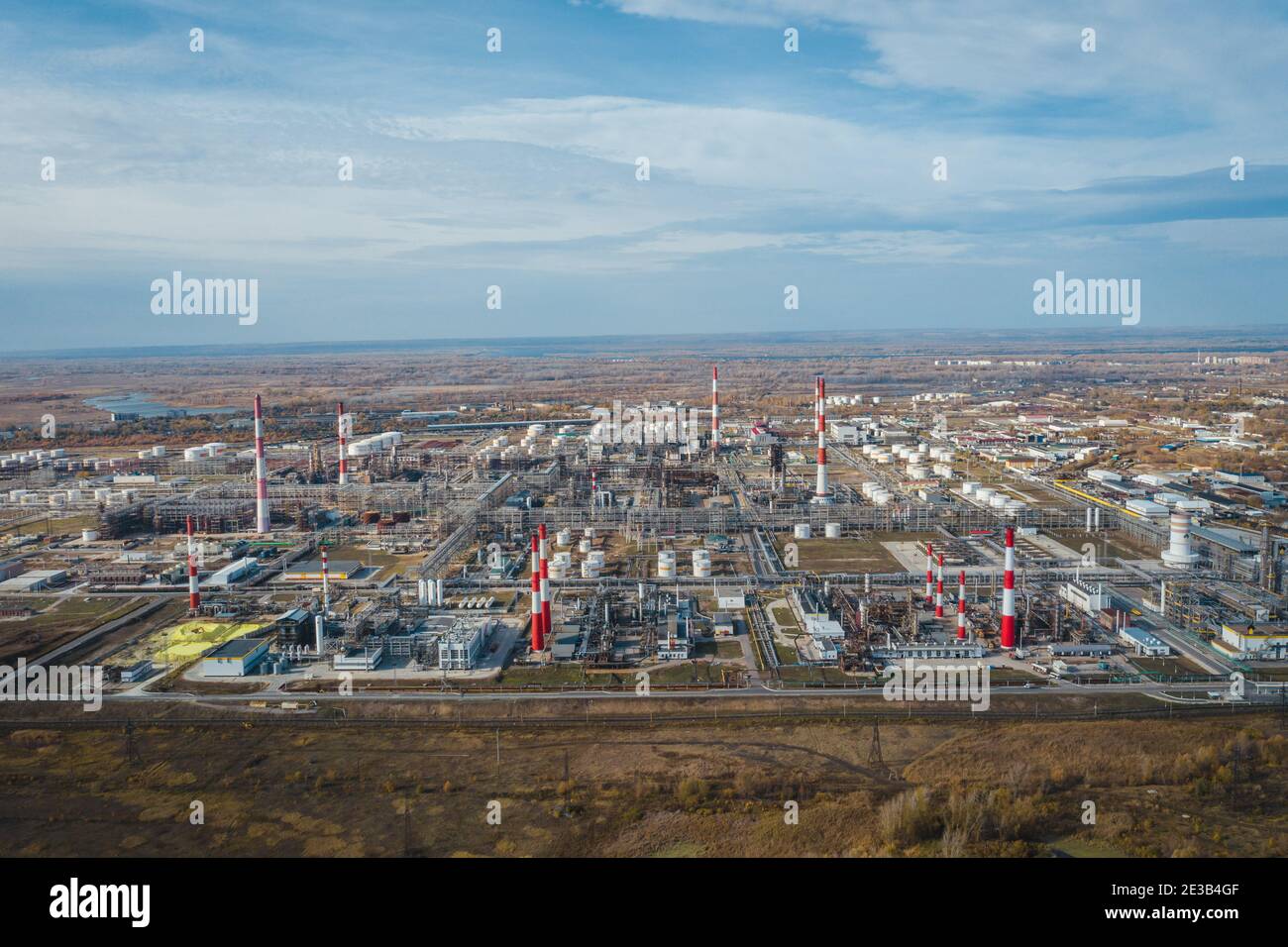 Oil and gas refinery large facility. Pipes and large tanks for oil ...