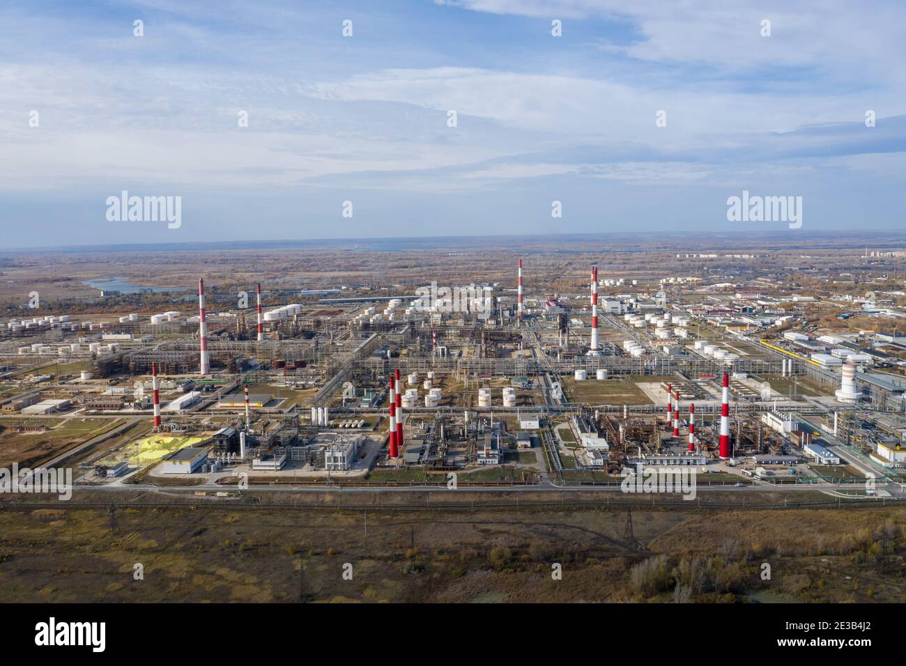 Oil and gas refinery large facility. Pipes and large tanks for oil ...