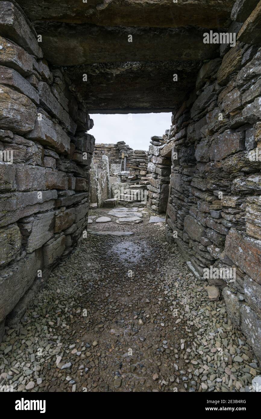 View of the stone entrance way into the main building of the Broch of ...
