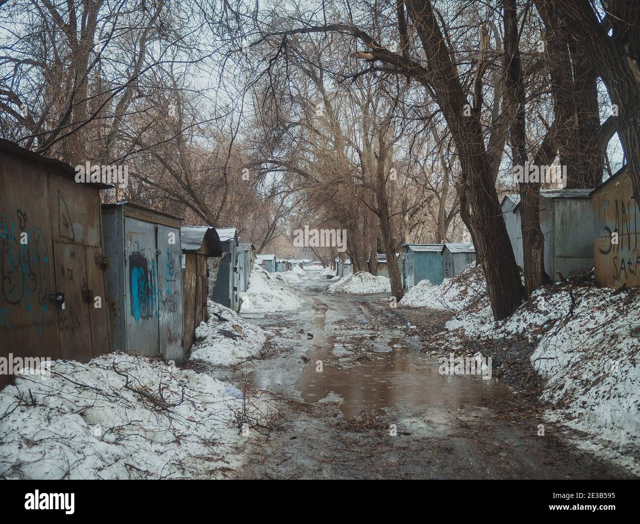 Winter and fall city depressive view with wet street Stock Photo - Alamy
