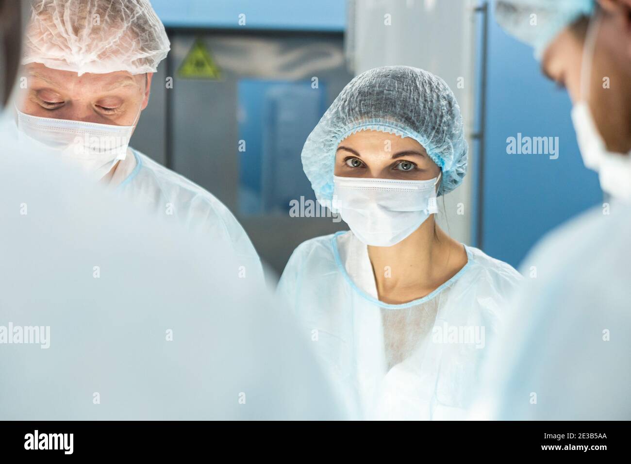 Portrait doctor performing surgical operation hi-res stock photography ...
