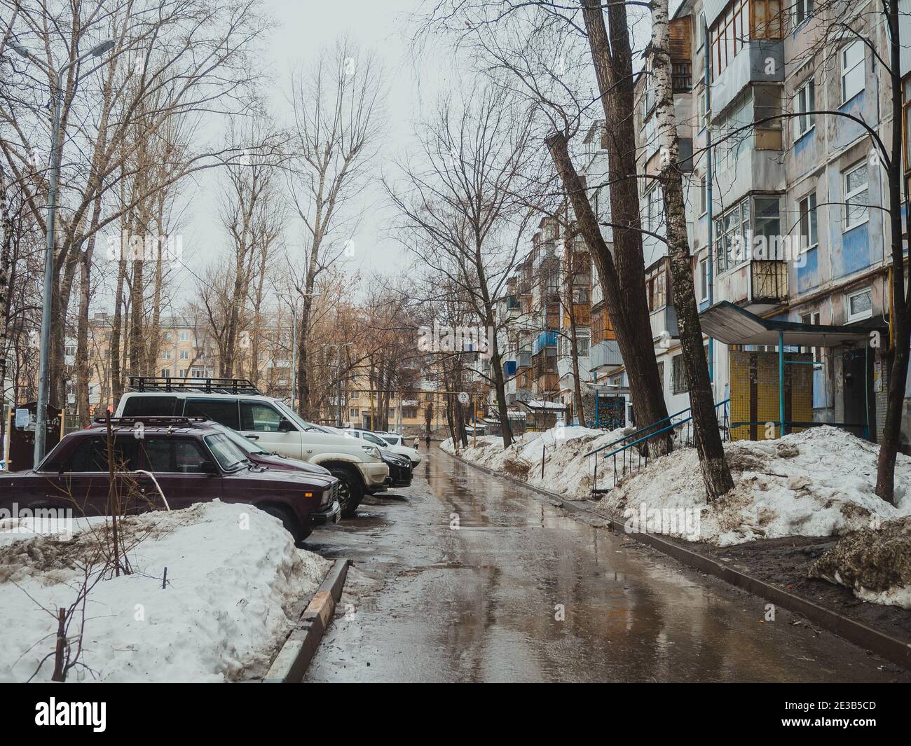 Winter and fall city depressive view with wet street Stock Photo - Alamy