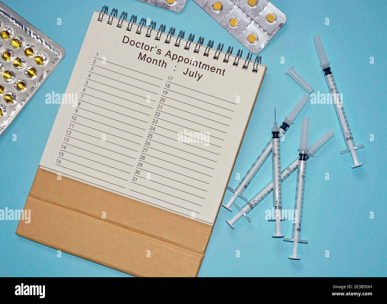 Month of July Doctor's Appointment calendar with disposable injection ...