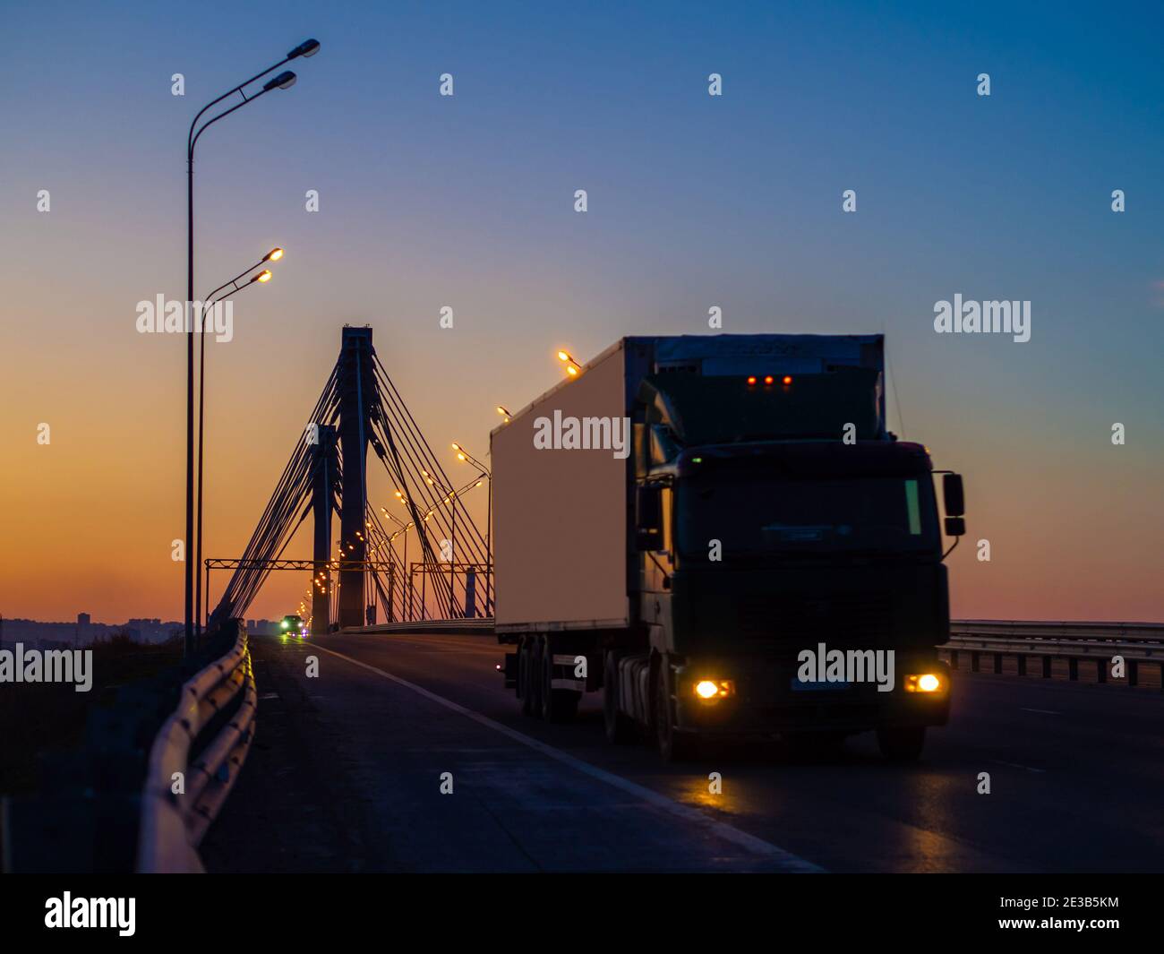 Cargo trucks sunset hi-res stock photography and images - Alamy