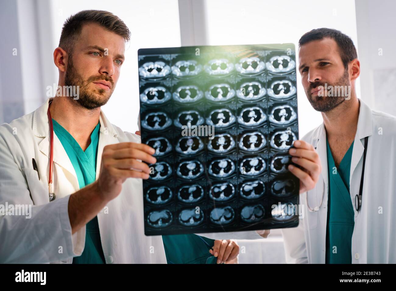 Group of doctors checking x-rays in a hospital Stock Photo - Alamy