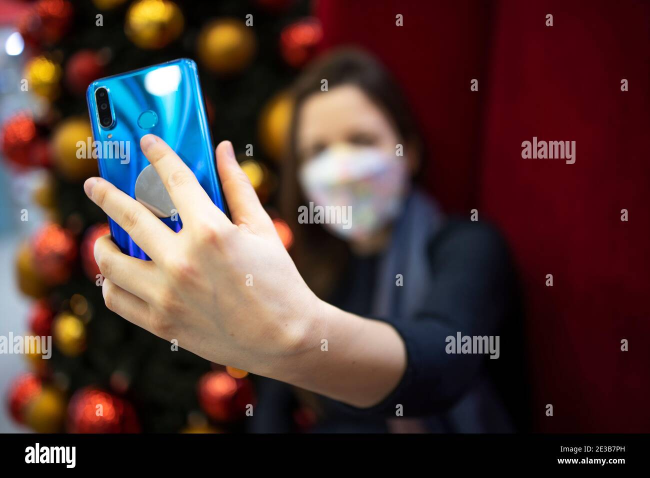 Woman taking photo christmas hi-res stock photography and images - Alamy