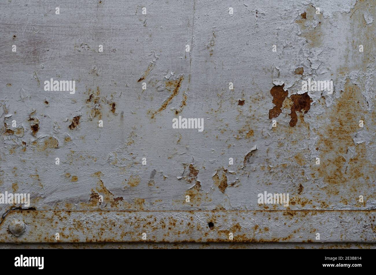 Cracked and peeling paint on metal. Gray paint on a rusted metal ...