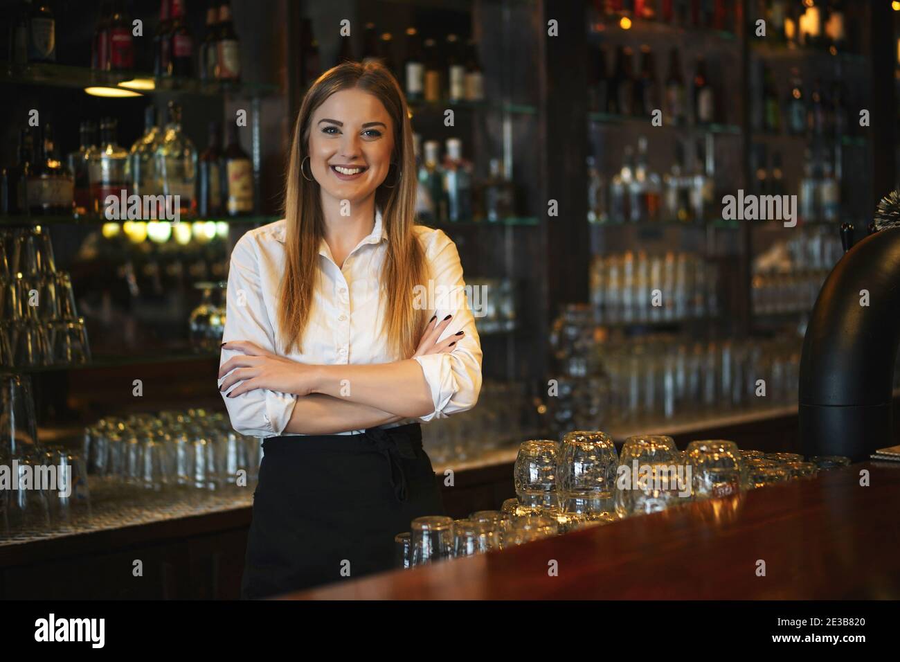 Bar woman looking bartender hi-res stock photography and images - Alamy