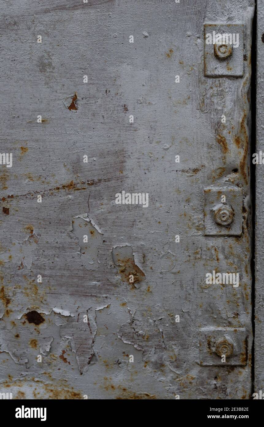 Cracked and peeling paint on metal. Gray paint on a rusted metal ...