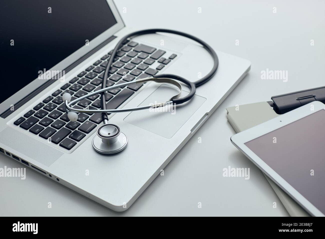 Stethoscope and laptop Stock Photo - Alamy