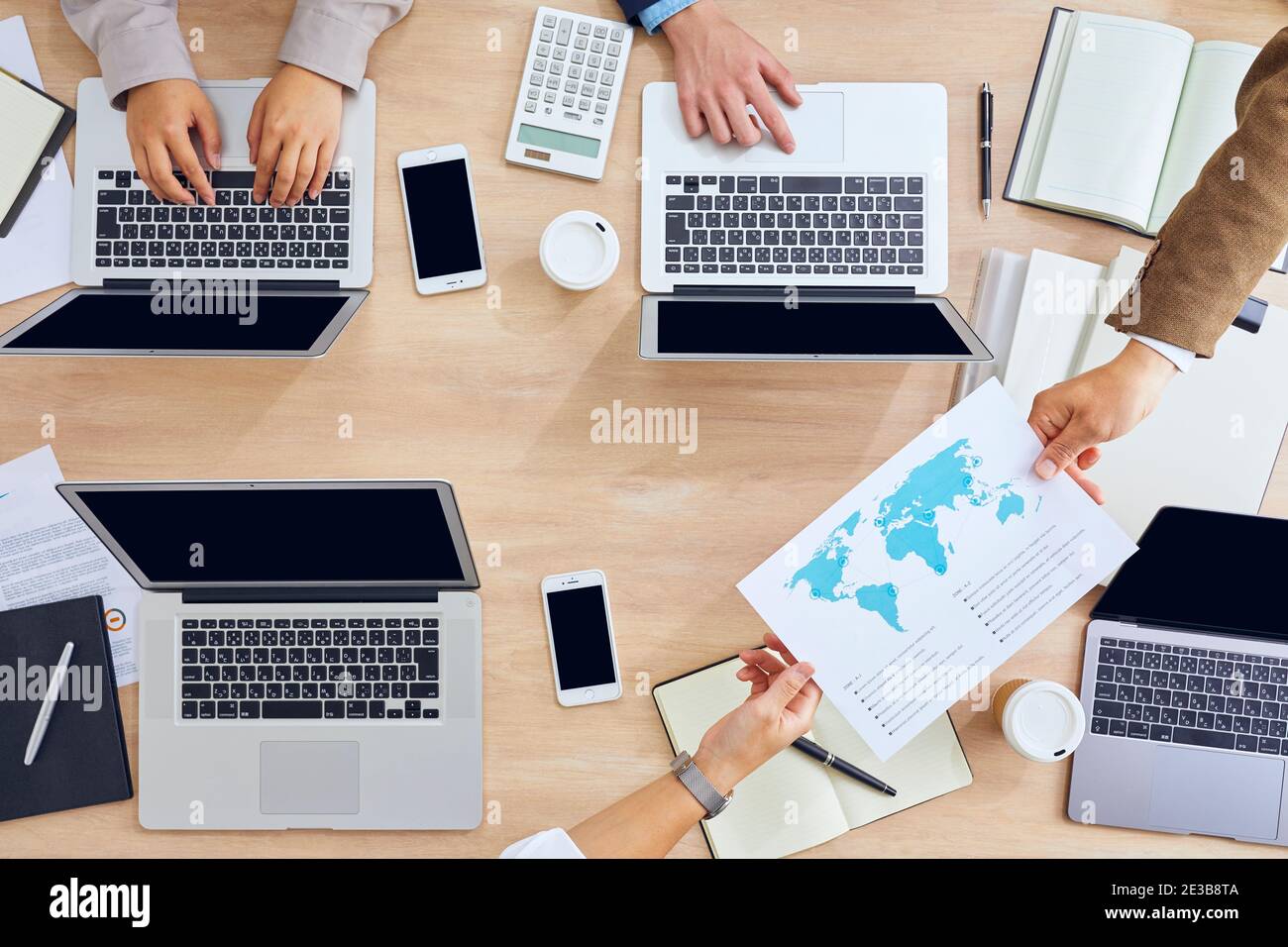 Top-down view of business people working in the office Stock Photo - Alamy