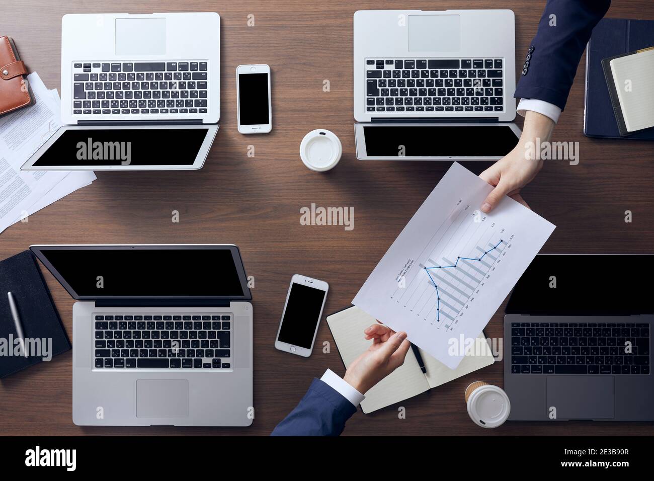 Top-down view of business people working in the office Stock Photo - Alamy