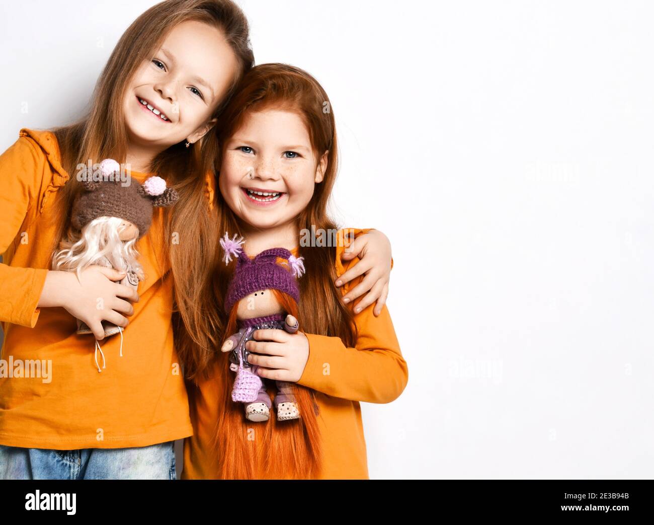 Portrait two happy sisters hugging hi-res stock photography and images ...